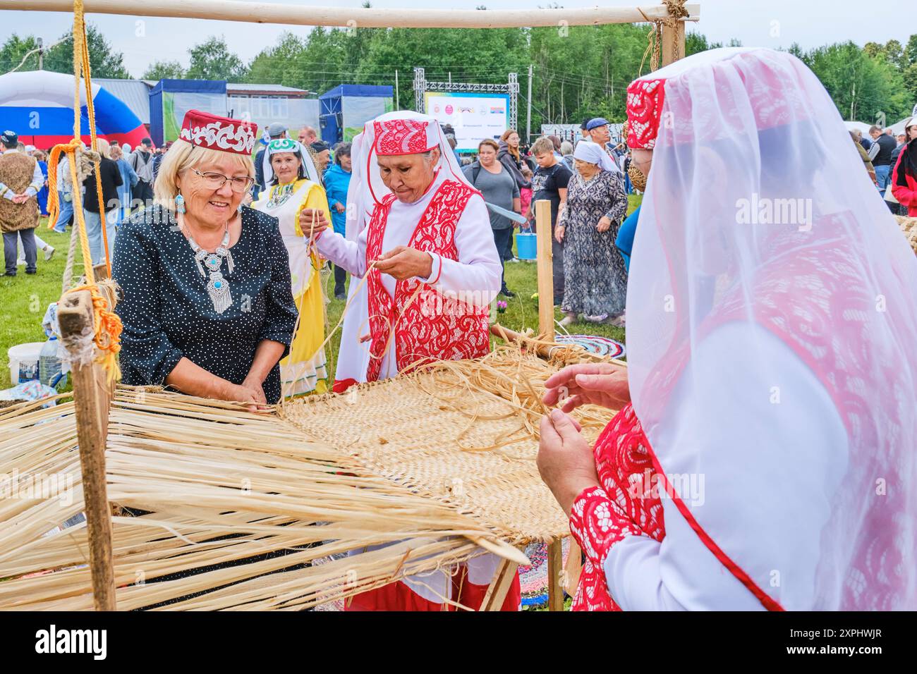 Tobolsk, Russia - July 20, 2024: Three Asian senior women in ...