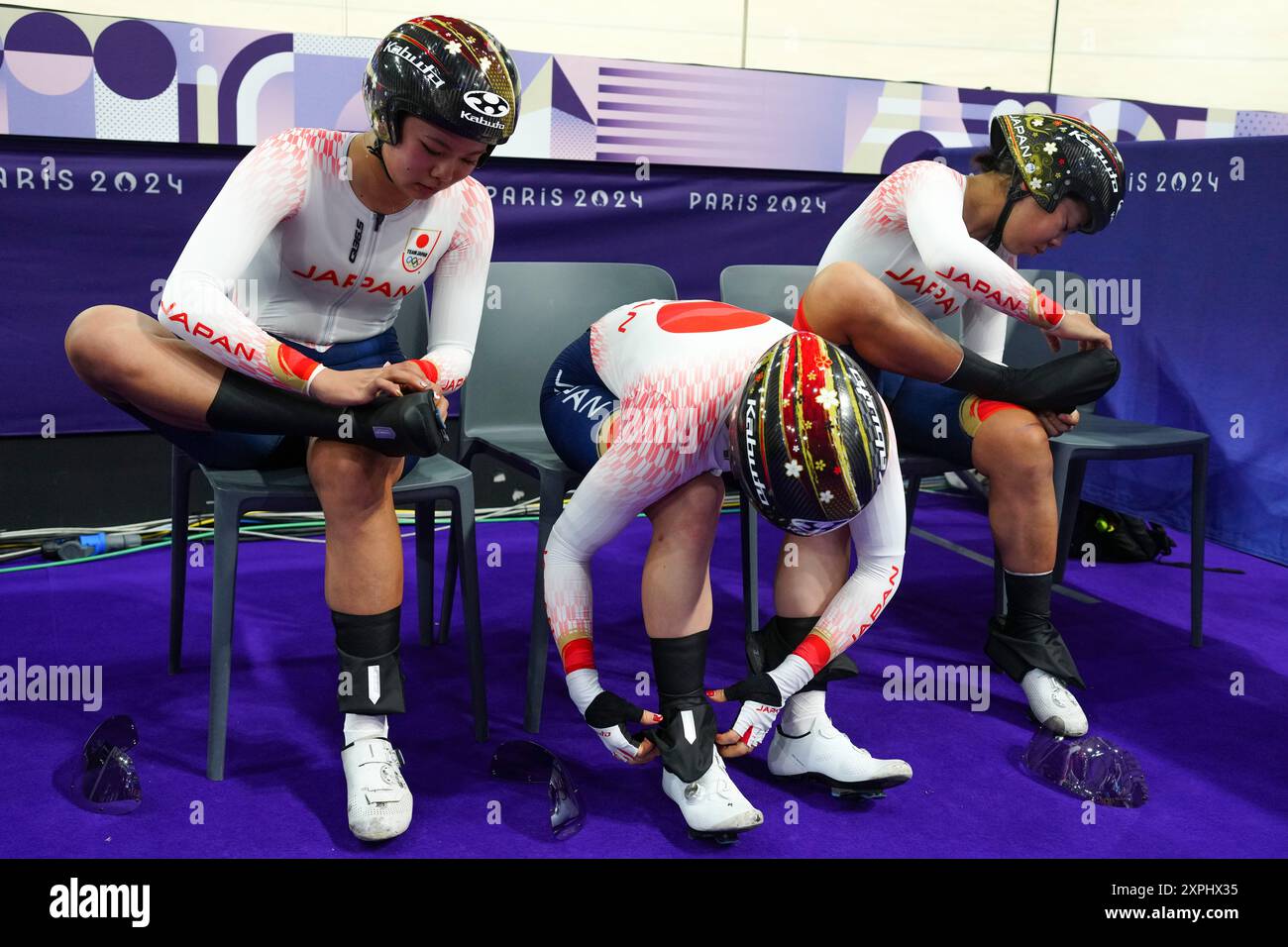Mizuki Ikeda of Japan, right, Maho Kakita of Japan, left, and Tsuyaka Uchino of Japan get ready ...