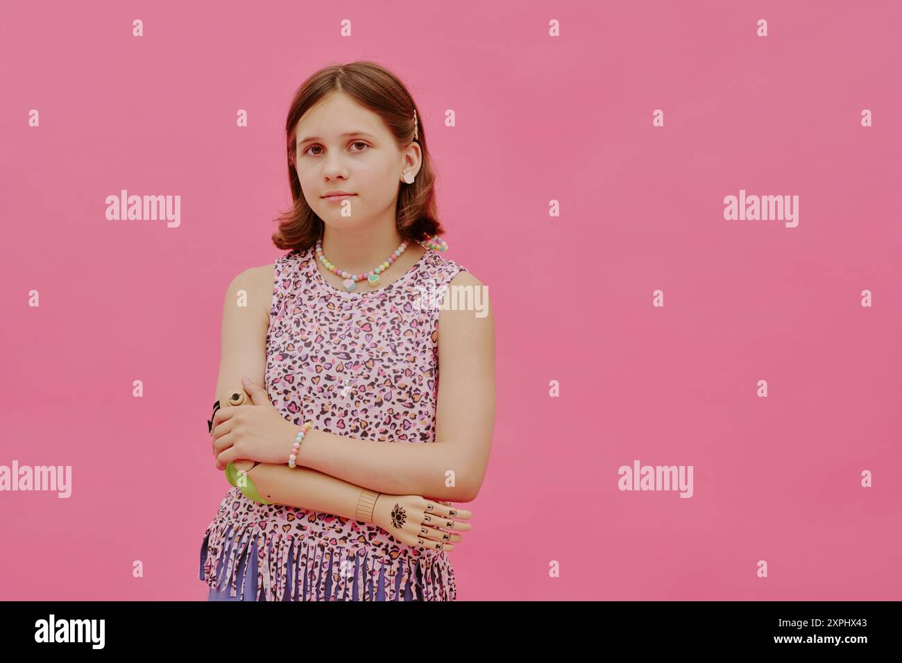 Girl With Disability Standing With Arms Crossed Stock Photo - Alamy