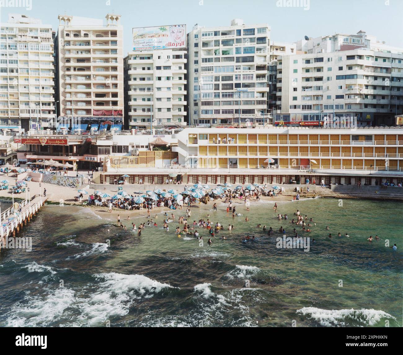 A bustling public beach at Stanley Bay in Alexandria, Egypt, Africa ...