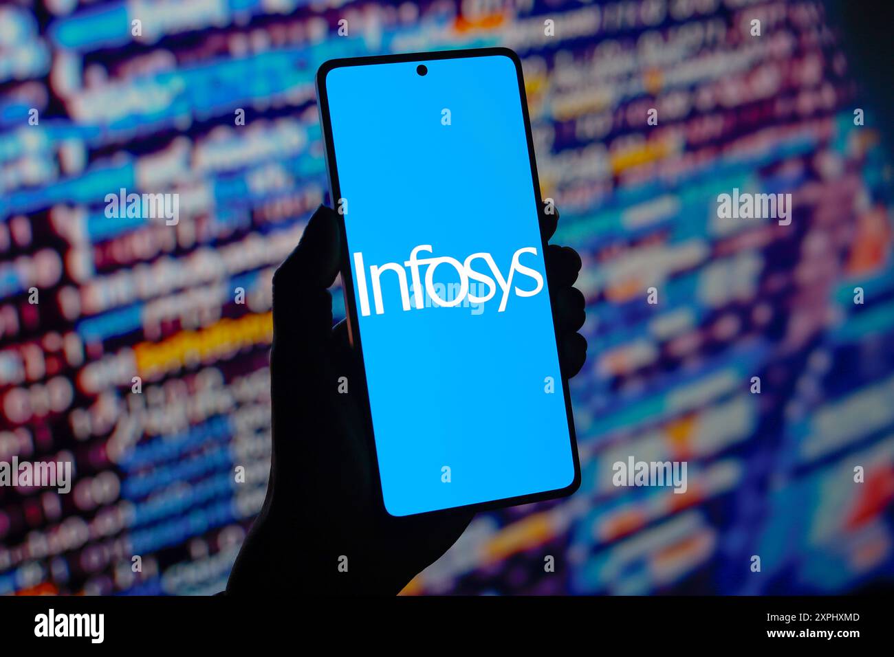 In this photo illustration, the Infosys Limited logo is displayed on a ...