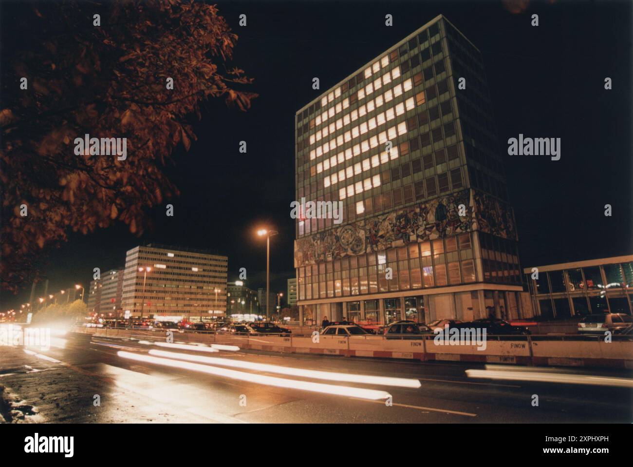 Night view of the Haus des Lehrers building in Alexanderplatz, Berlin-Mitte, Germany ...