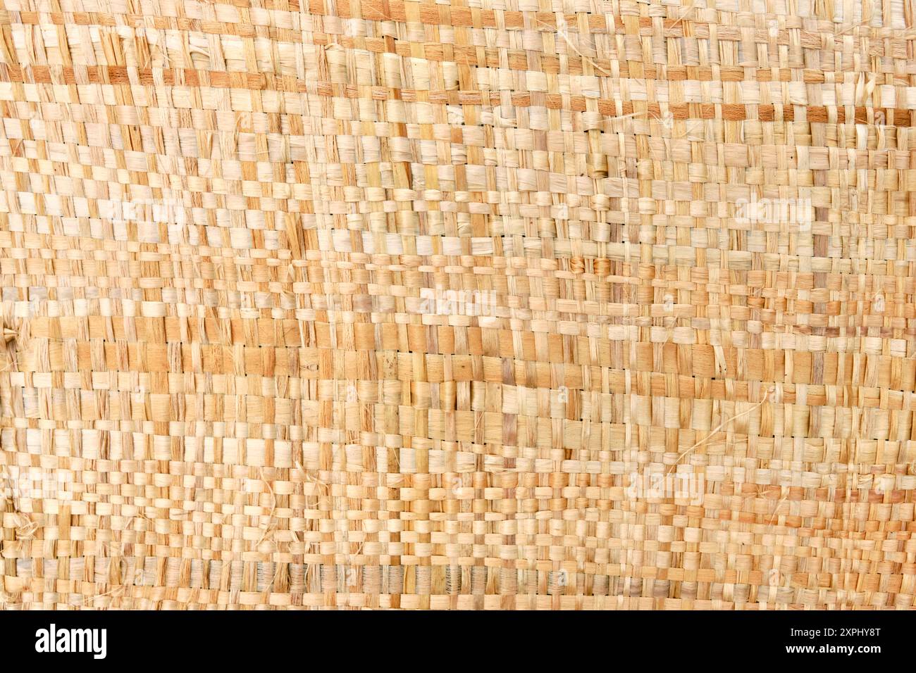 Texture of weavered bast cloth on wooden manual loom as rural abstract ...