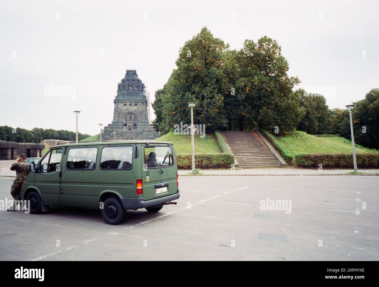 A Bundeswehr bus parked at the iconic Völkerschlachtdenkmal monument in ...