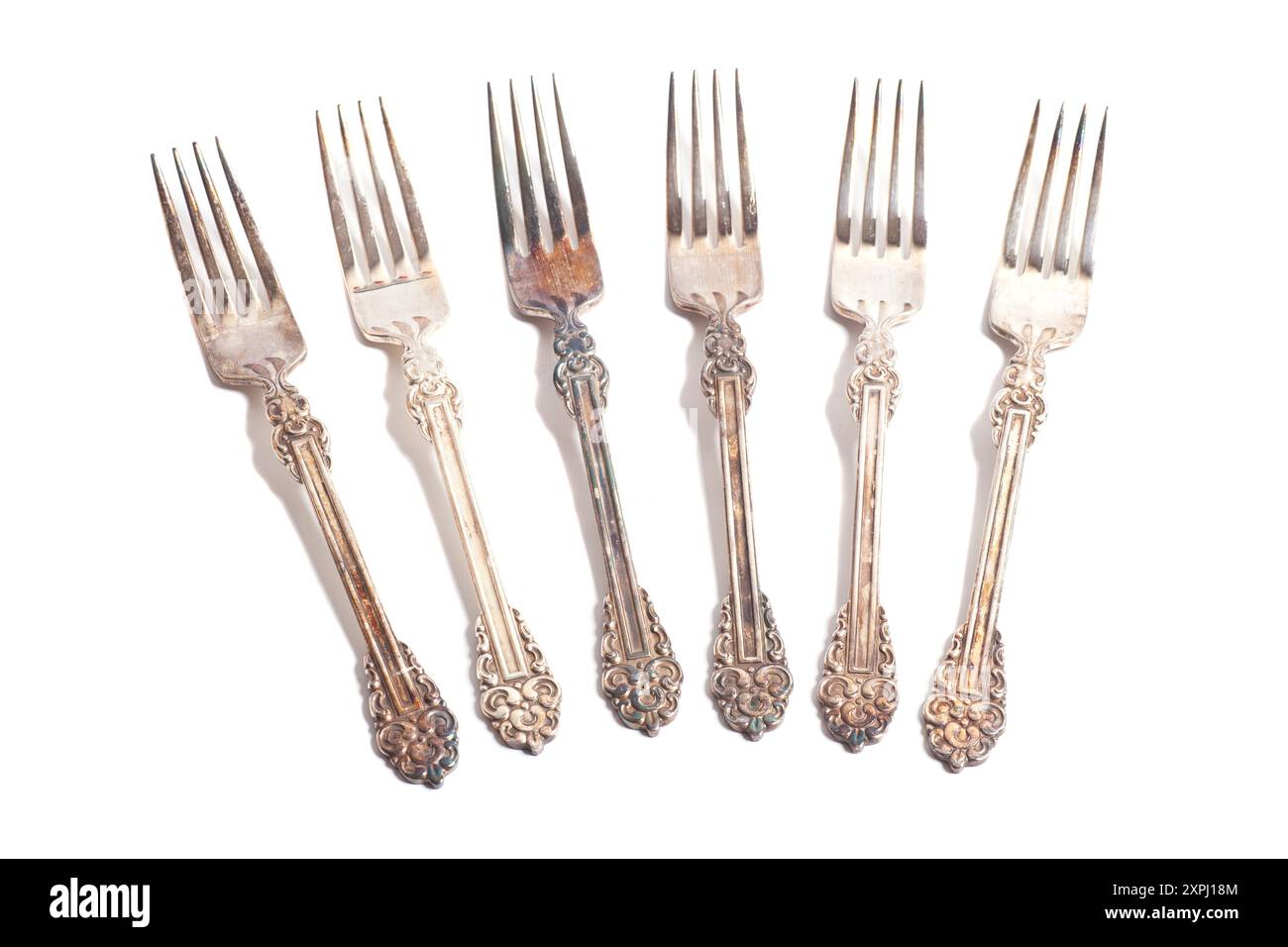 collection of old silver forks isolated on white Stock Photo - Alamy