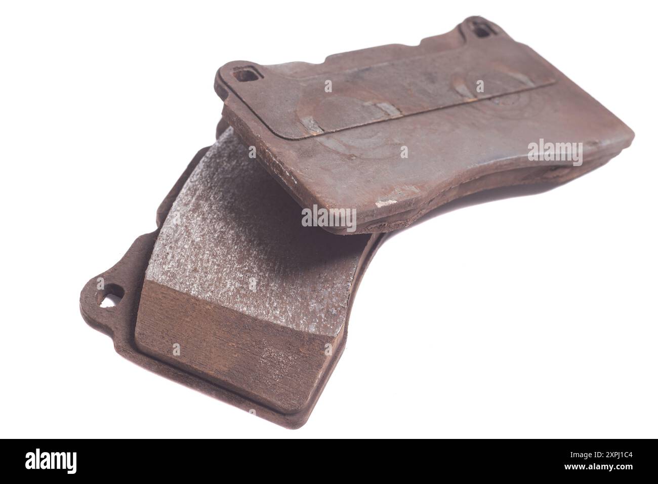 old auto brake pads isolated on white background Stock Photo - Alamy