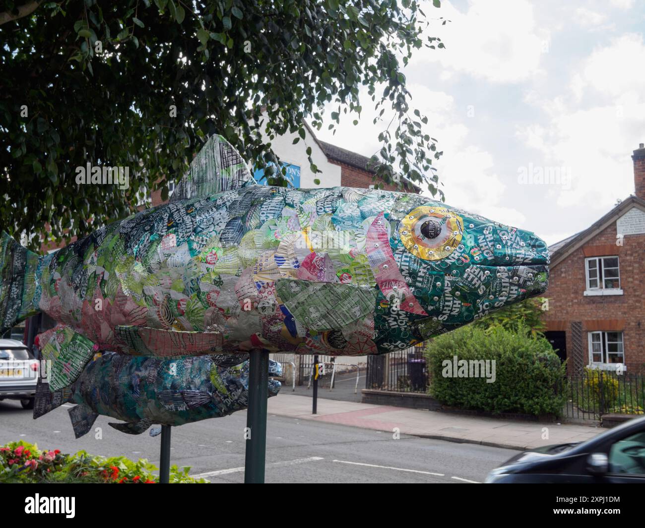 Fish sculpture made from recycled drinks cans Stock Photo - Alamy