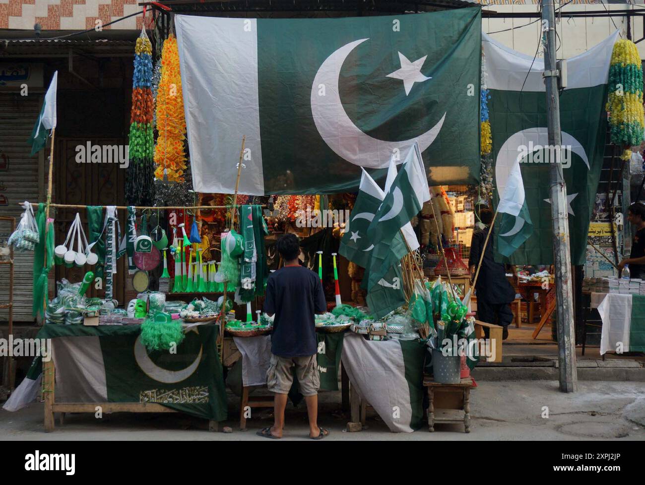 Pakistan flags, buntings, printed shirts and other items are being ...