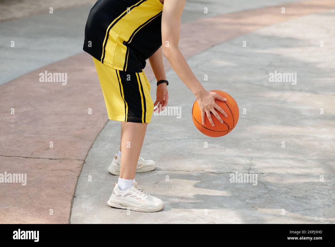 Basketball dribbling teenager hi-res stock photography and images - Alamy