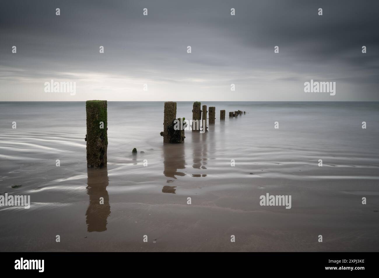 Youghal Strand Groynes on a warm summer morning just before the rain ...