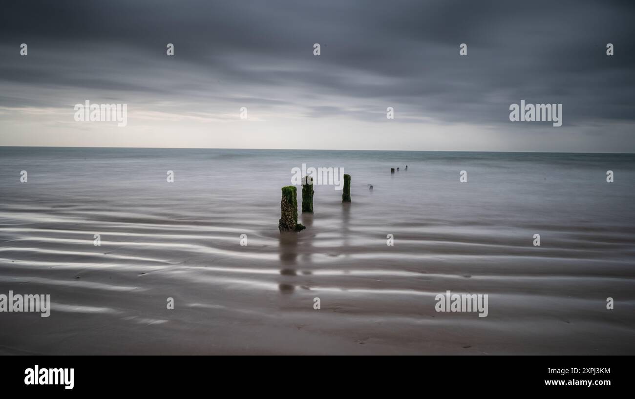 Youghal Strand Groynes on a warm summer morning just before the rain ...