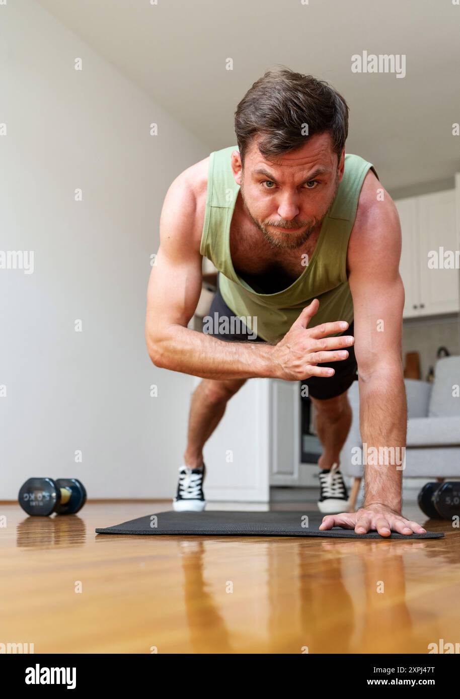 Muscle man doing plank position hi-res stock photography and images - Alamy