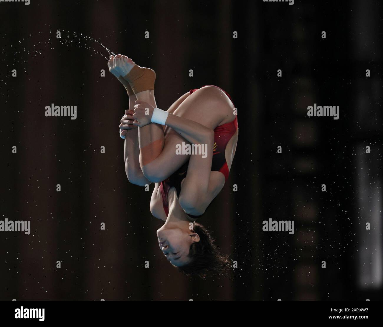 QUAN Hongchan of China performs during the women's diving 10-meter ...