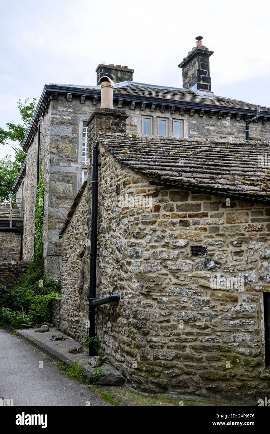 Grassington Yorkshire UK- 27 July 2024. Stone-built cottage house with ...