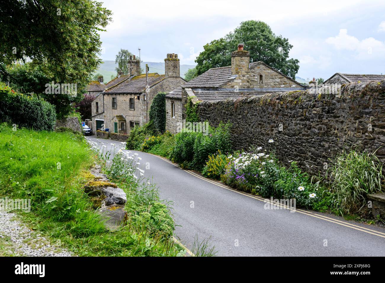Grassington Yorkshire UK- 27 July 2024. Charming rural village road ...