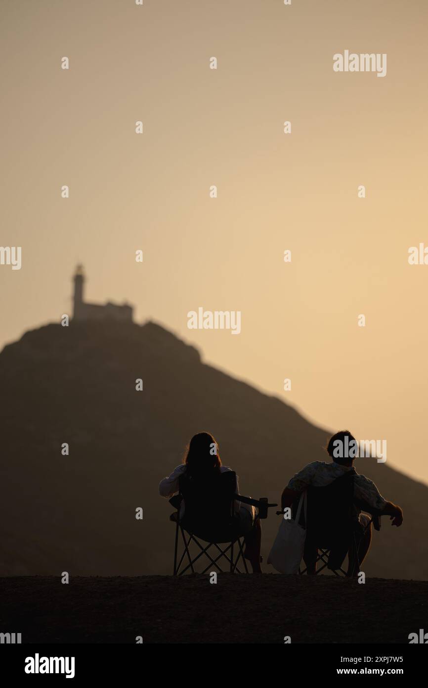 Man on a mountain watching city hi-res stock photography and images - Alamy