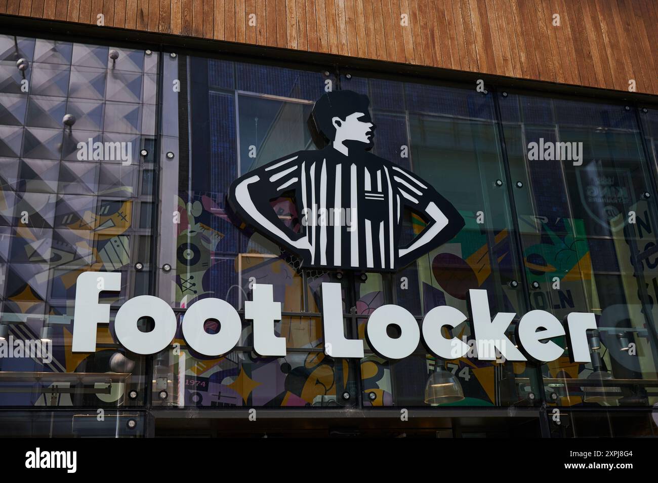 Cologne, Germany - August 05,2024: Foot locker logo over a local store ...