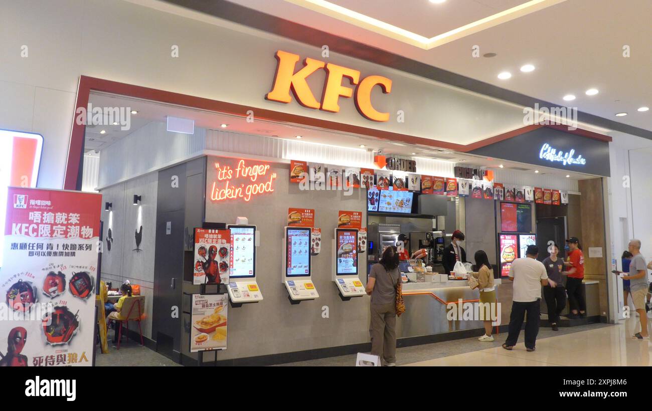 customers seen ordering food at the American fast-food restaurant chain Kentucky Fried Chicken ...