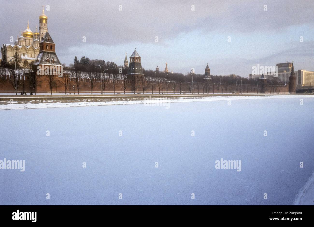 1990 archive photograph of the Moscow Kremlin seen across the frozen ...