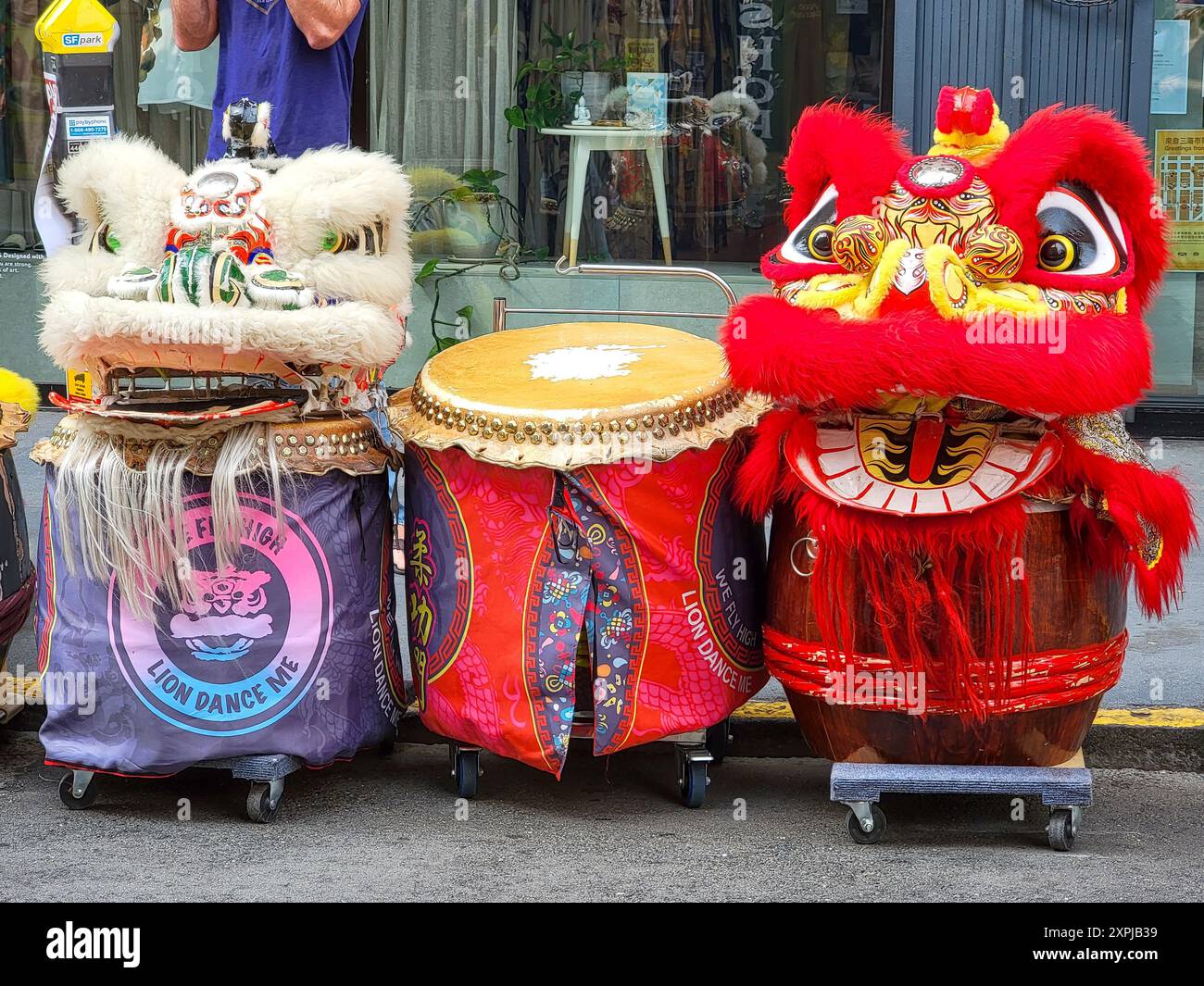 The traditional Chinese lion dance costumes and drums on a street in ...