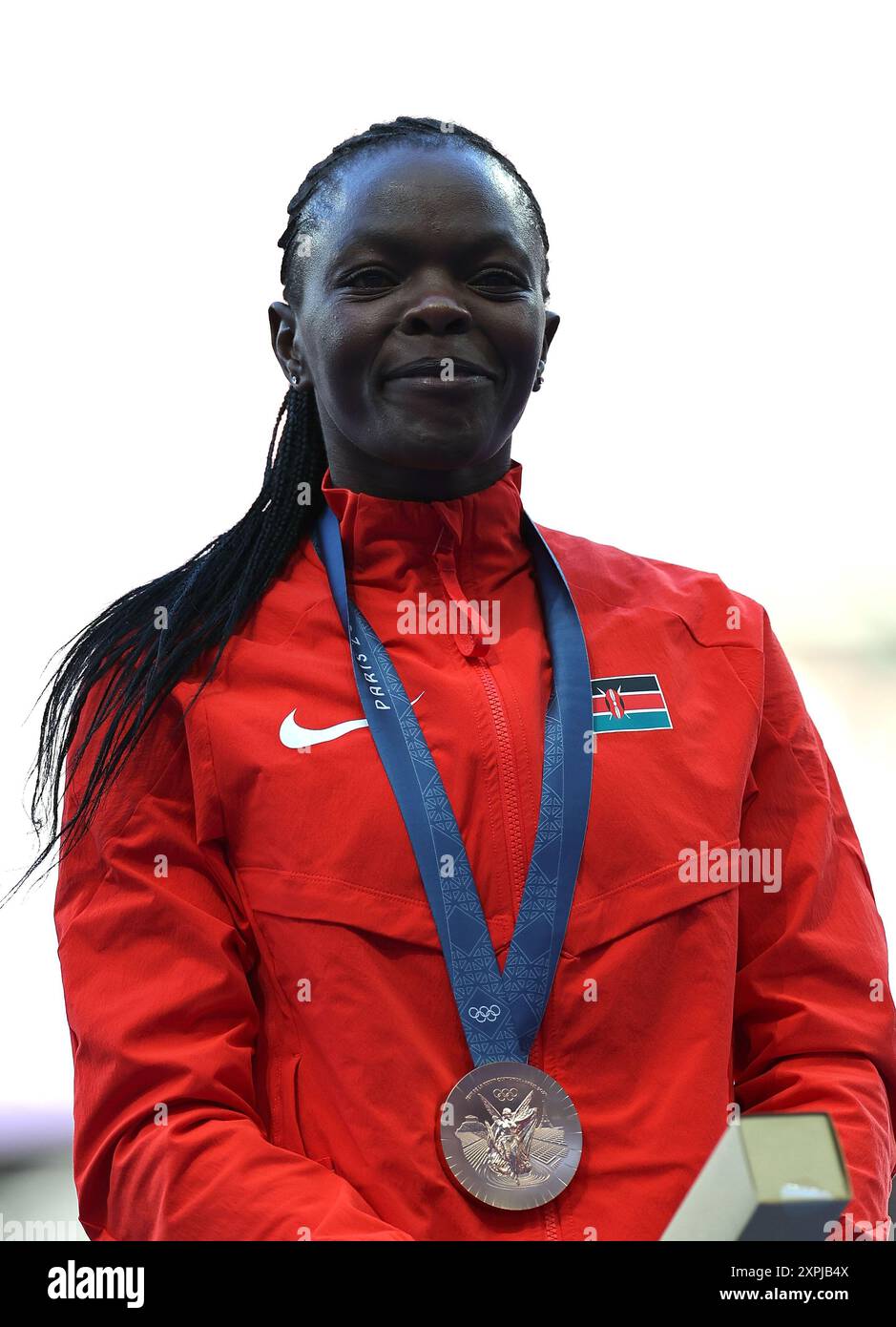 Paris, France. 6th Aug, 2024. Bronze medalist Mary Moraa of Kenya reacts during the victory ...