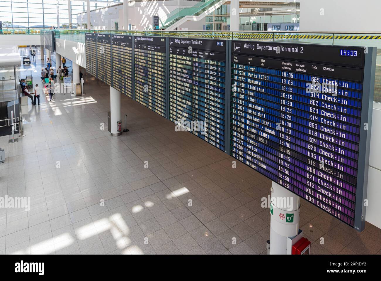 MUNICH, GERMANY - AUGUST 6, 2024: Airport sign of flights destinations ...