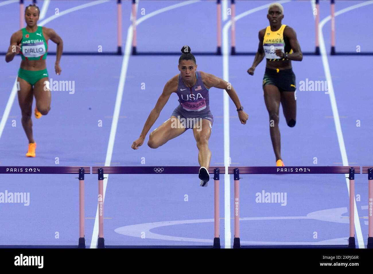 Sydney McLaughlin-Levrone, of the United States, leads in a women's 400 ...