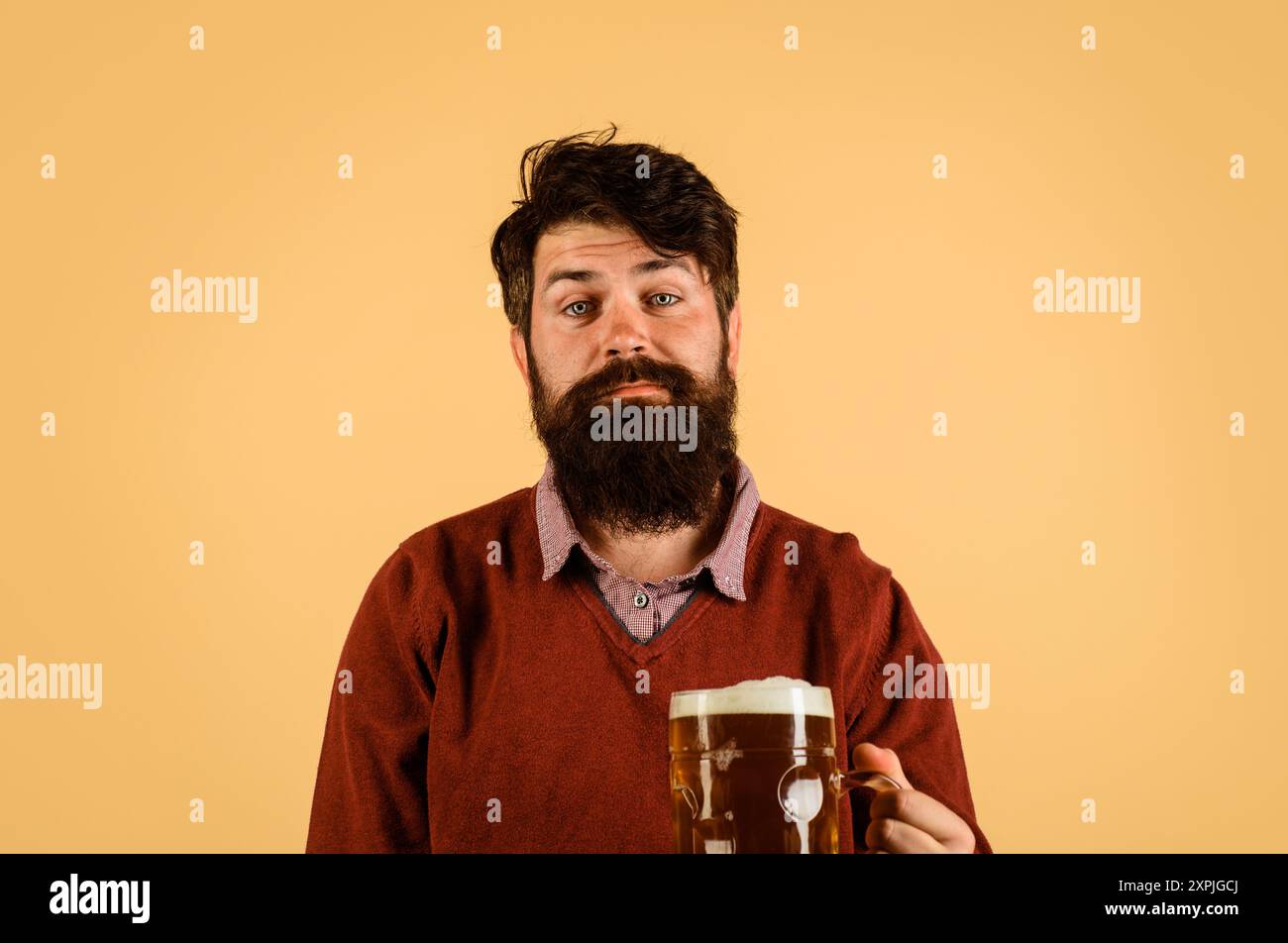 Oktoberfest and beer time. Drunk bearded man tasting fresh brewed beer ...