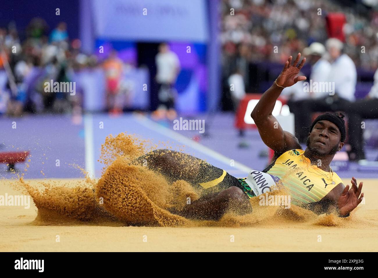Wayne Pinnock, of Jamaica, competes during the men's long jump final at ...