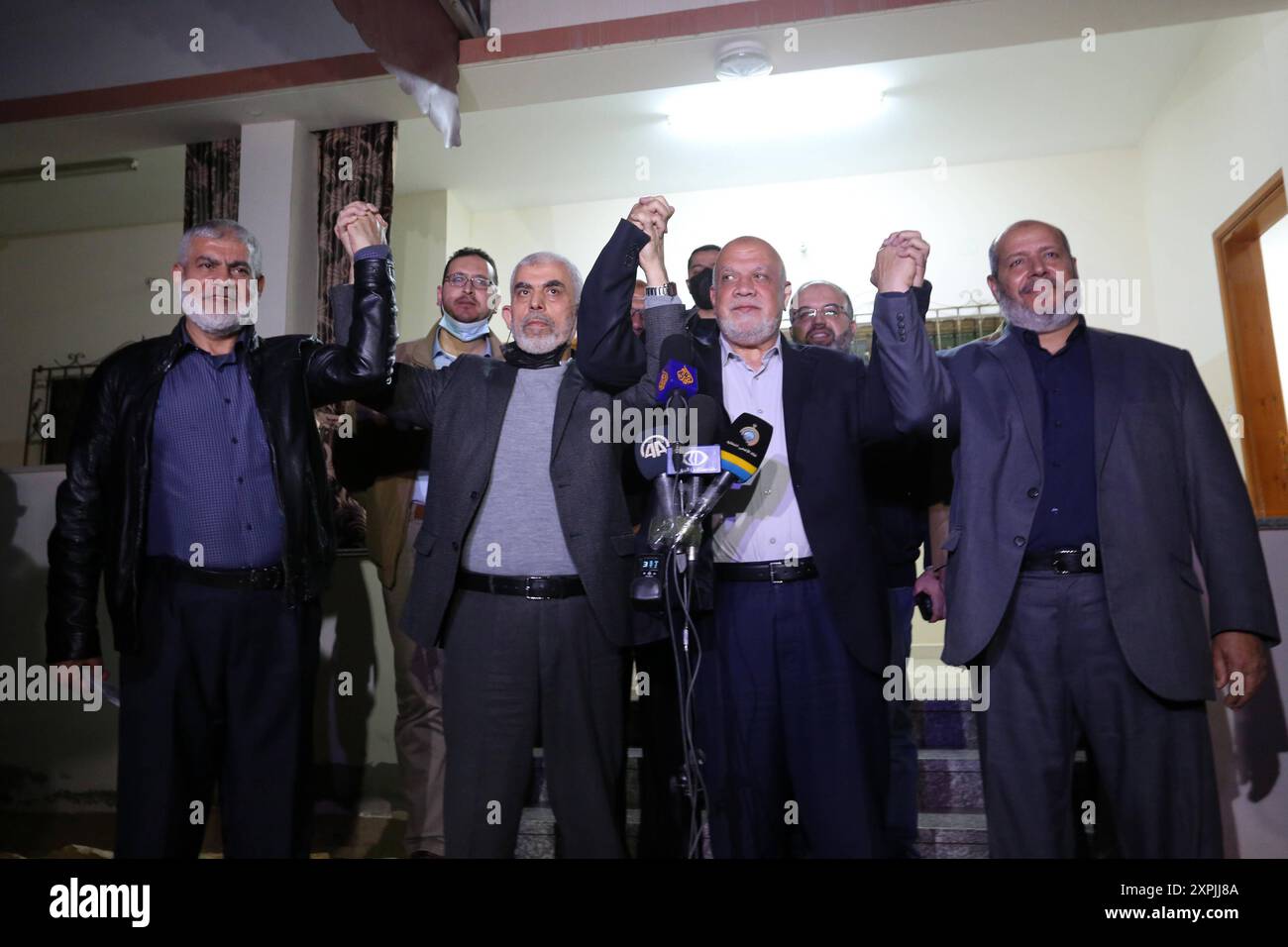 Senior Hamas leaders celebrate after announced the election of Yahya ...