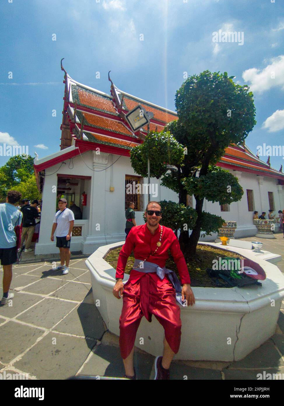 Wat Arun , foreigner wear traditional outfit Stock Photo - Alamy