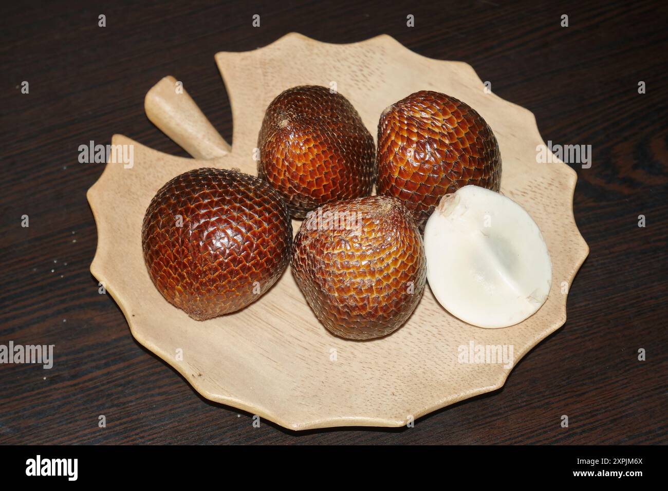 Snake Fruit (Salacca zalacca) because of its scaly skin. Contains ...