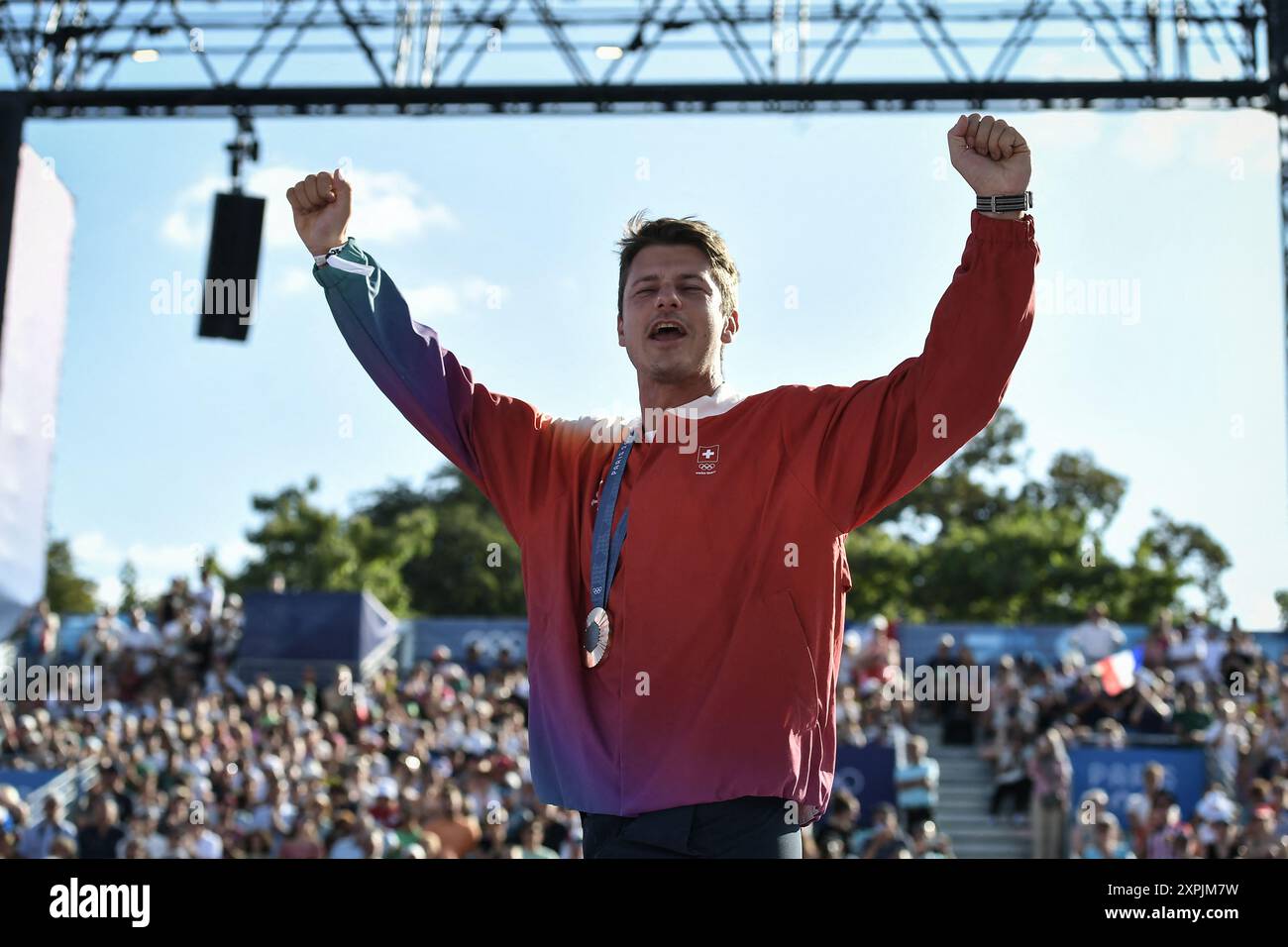 Switzerland’s bronze medalist at rowing, Roman Roosli arrives as fans ...