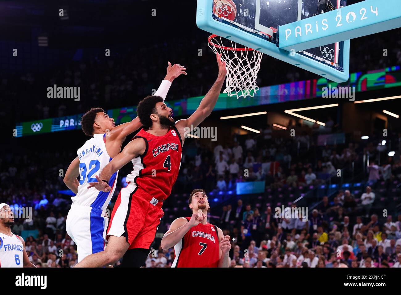 Paris, France, 6 August, 2024. Jamal Murray of Team Canada slam dunks ...