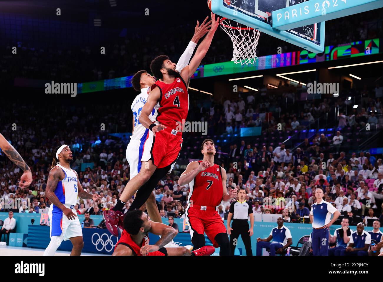 Paris, France, 6 August, 2024. Jamal Murray of Team Canada slam dunks ...