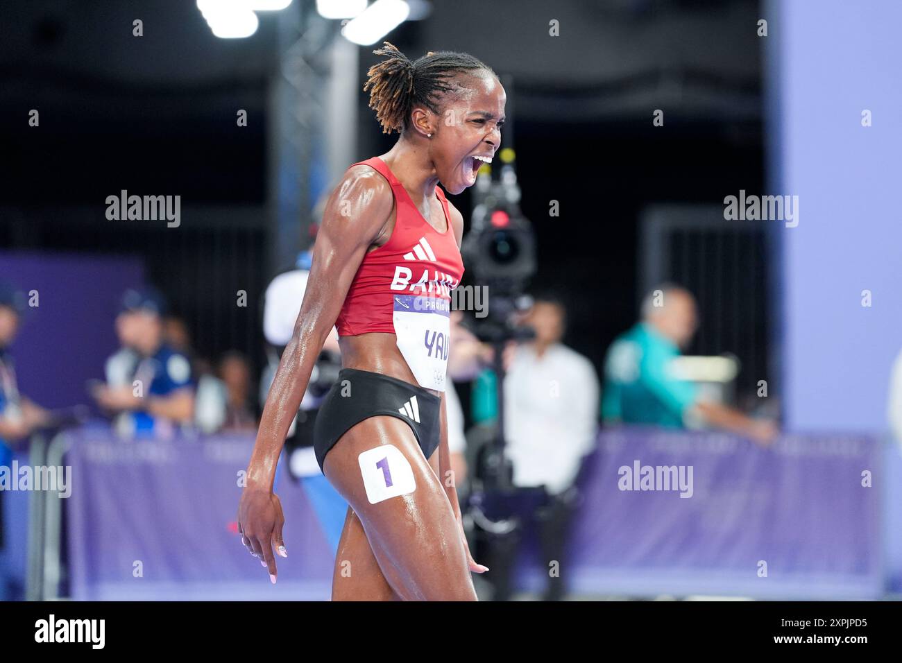 Winfred Yavi, of Bahrain, celebrates after winning the women's 3000 ...