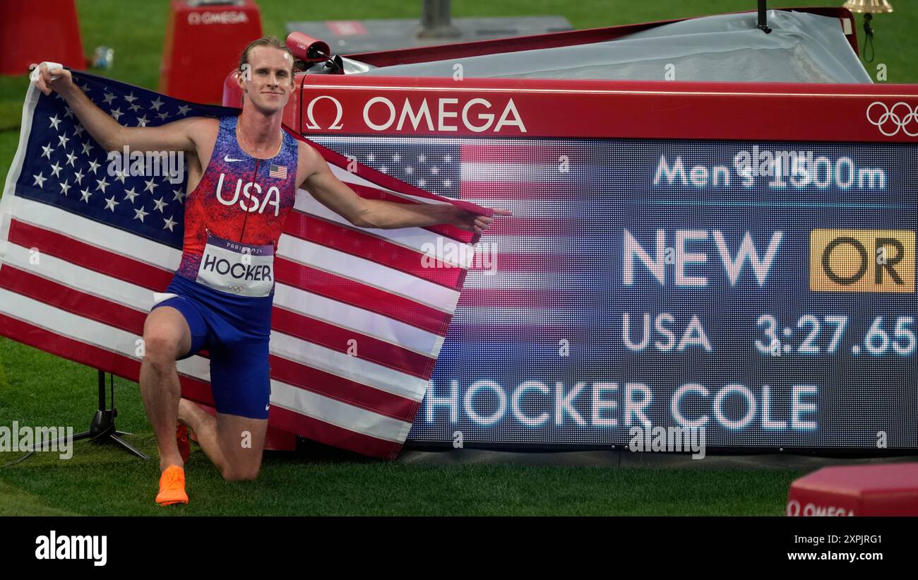 Cole Hocker, of the United States, poses for a photo after setting an ...