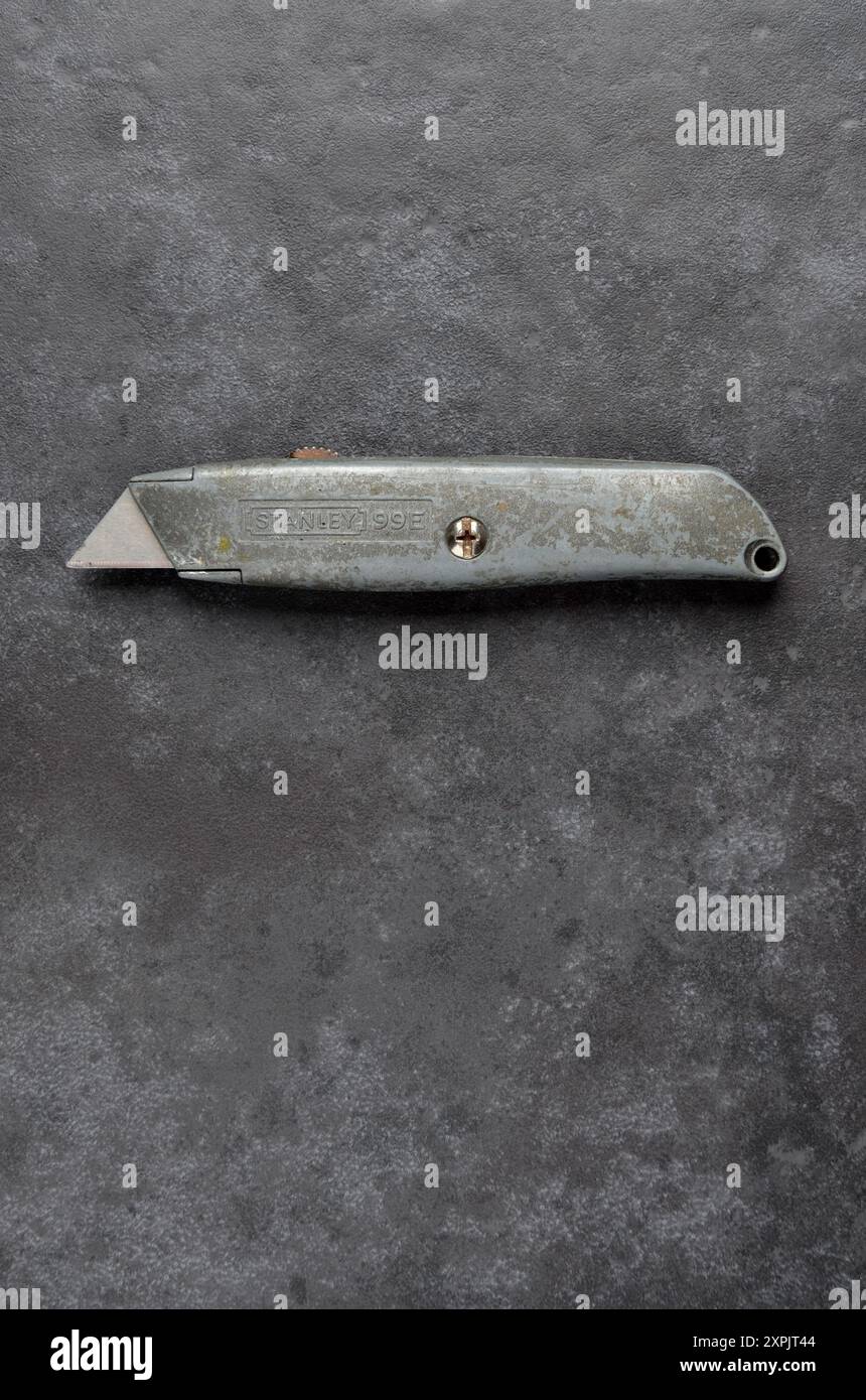 Stanley Knife old and used showing signs of age, shot from above on ...