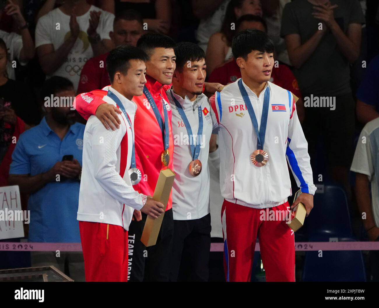 (L to R) China's CAO Liguo, silver, Japan's FUMITA Kenichiro, gold, and Kyrgyzstan's ...