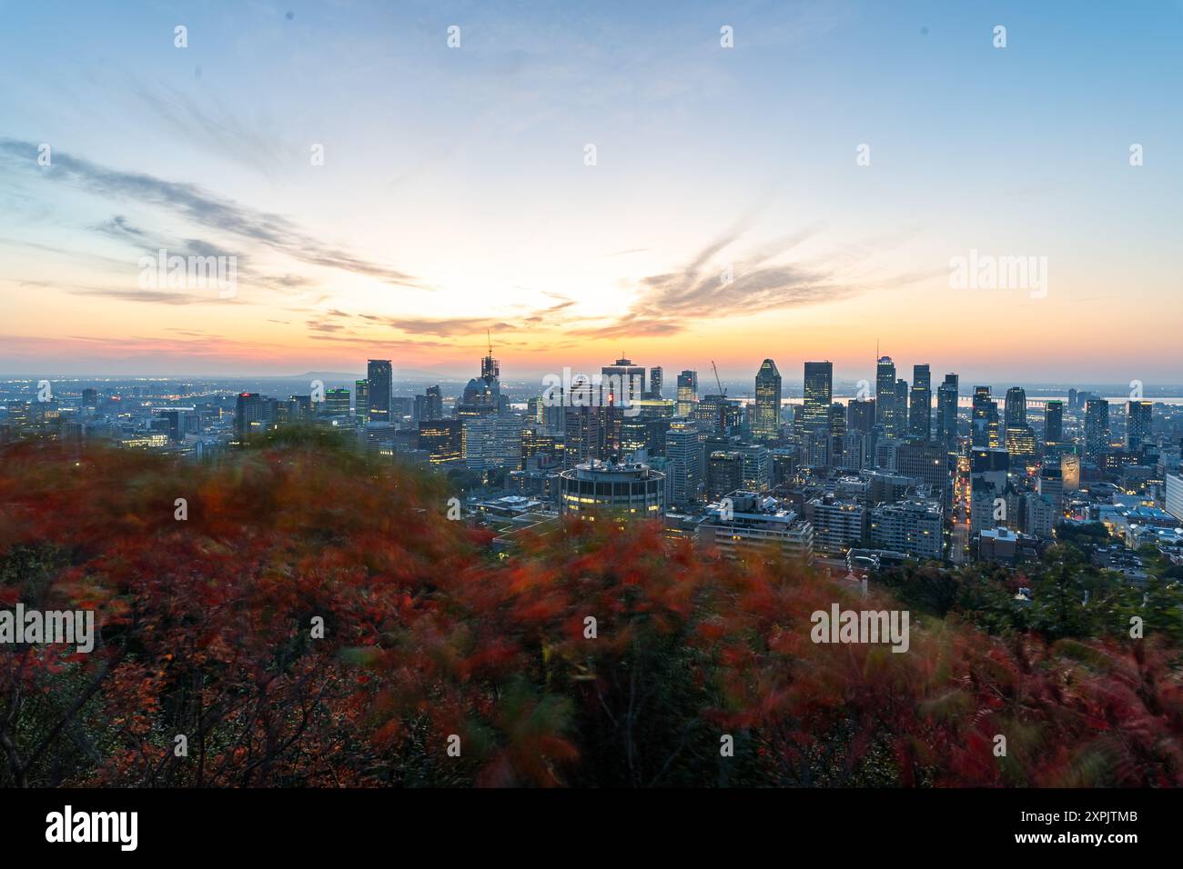 Montreal sunrise from Mont Royal Kondiaronk Belvedere with colorful ...