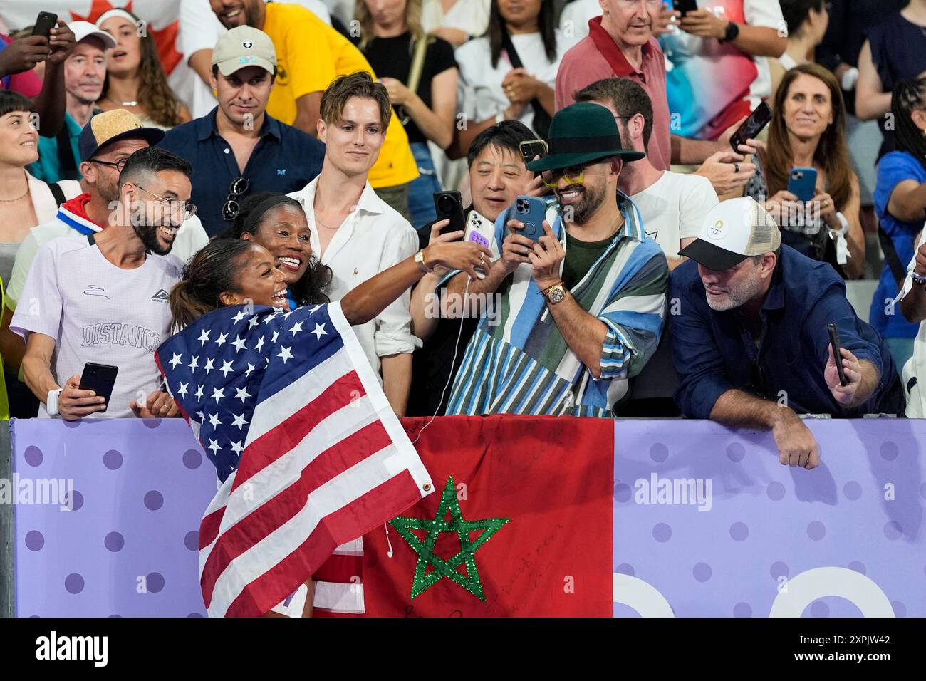 Gabrielle Thomas, of the United States, celebrates after winning the ...