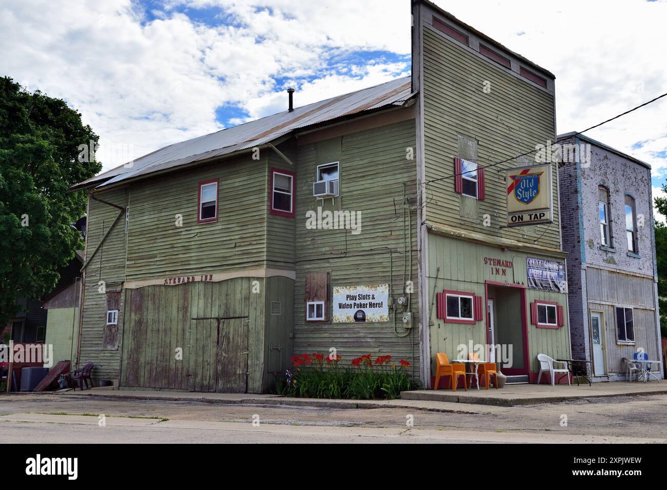 Steward, Illinois, USA. A well-weathered exterior of a local tavern in ...