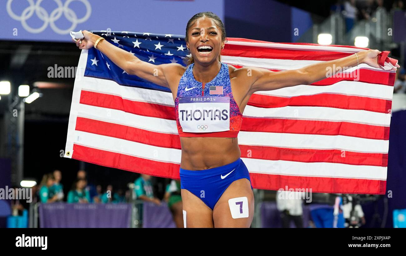 Gabrielle Thomas, of the United States, celebrates after winning the ...