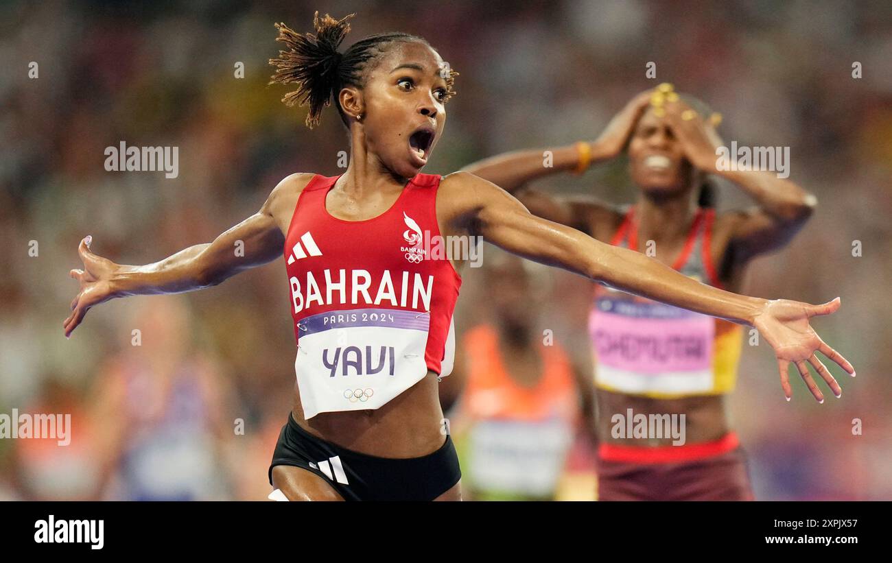 Winfred Yavi, of Bahrain, celebrates after winning the women's 3000 ...