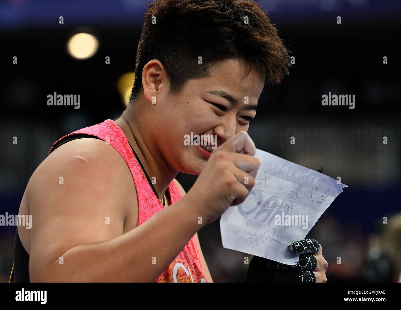Paris, France. 6th Aug, 2024. Zhao Jie of China shows her bib paper ...