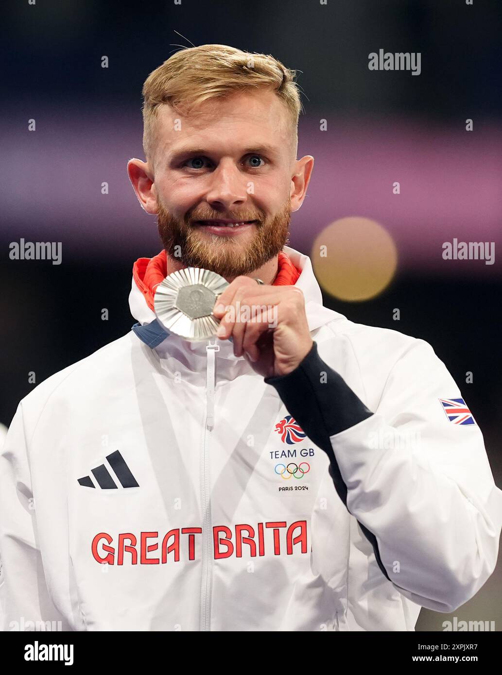 Great Britain's Josh Kerr with his silver medal following the Men's ...