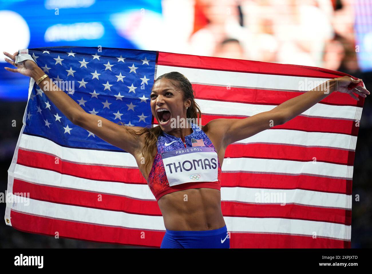 Gabrielle Thomas, of the United States, celebrates after winning the ...