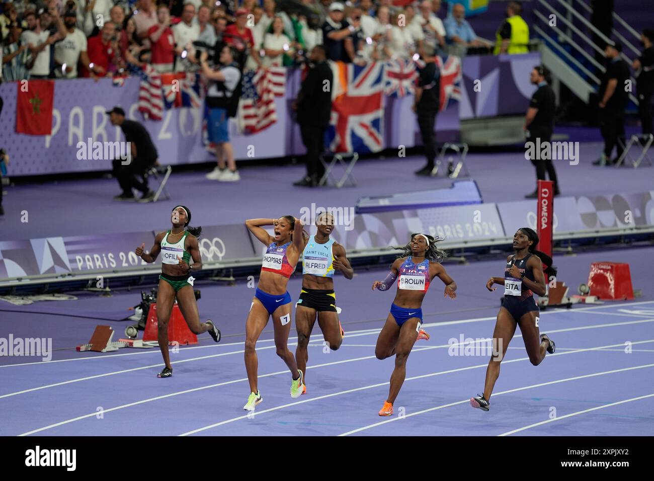 Gabrielle Thomas, of the United States, reacts as she wins the women's ...