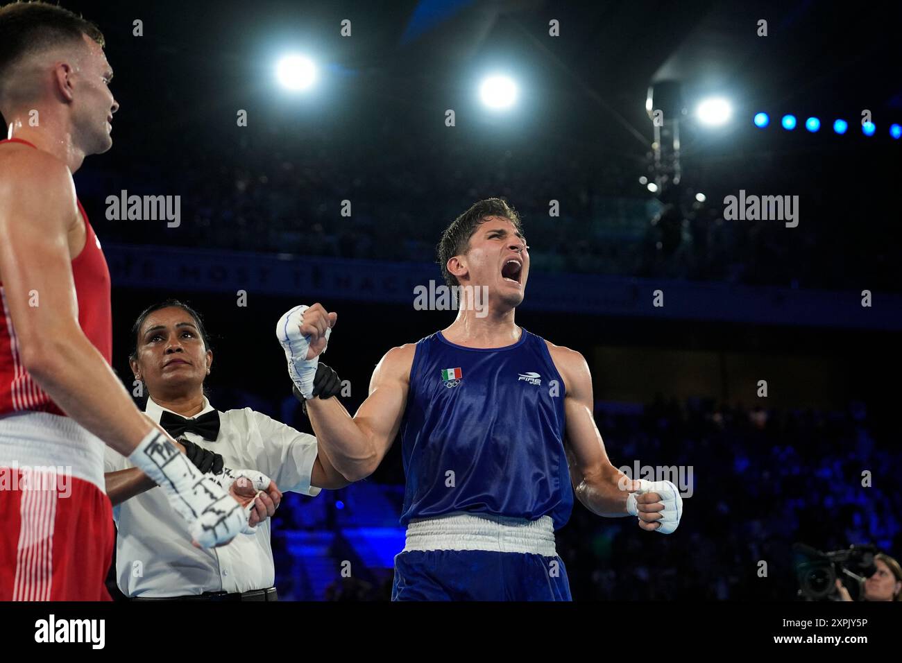 Mexico's Marco Verde celebrates after defeating Britain's Lewis ...