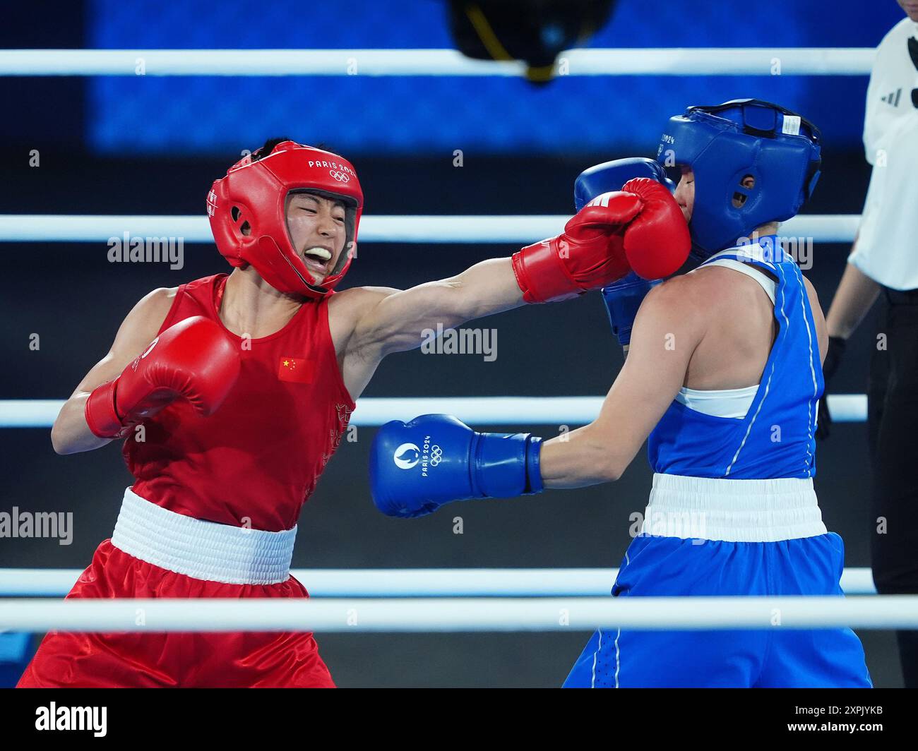 Kazakhstan’s Nazym Kyzaibay (left) in action against China’s Yu Wu ...